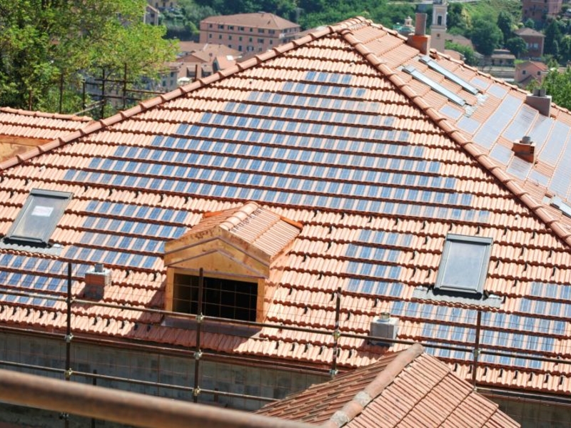 Photovoltaic-cells-designed-to-blend-in-with-terracotta-roofs